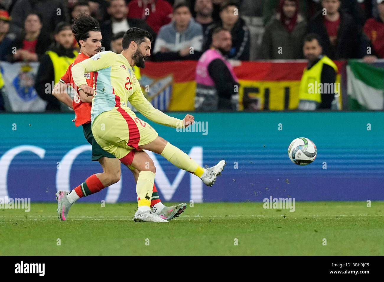 Spain's Isco, front, attempts a shot on goal during the Nations League ...