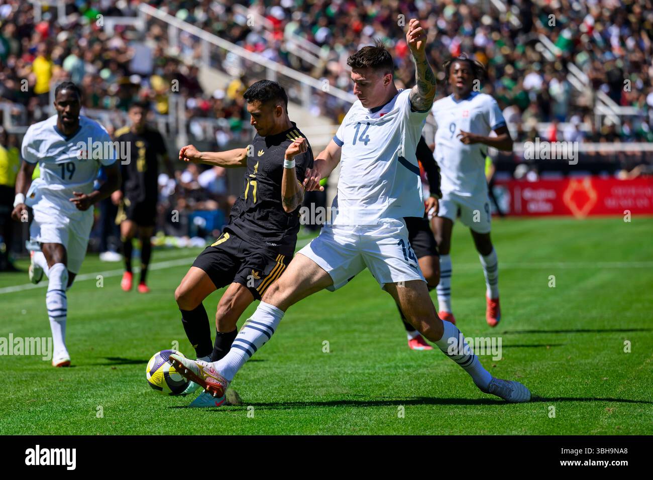 Switzerland's Cédric Zesiger (14) stops the attack from Mexico's ...