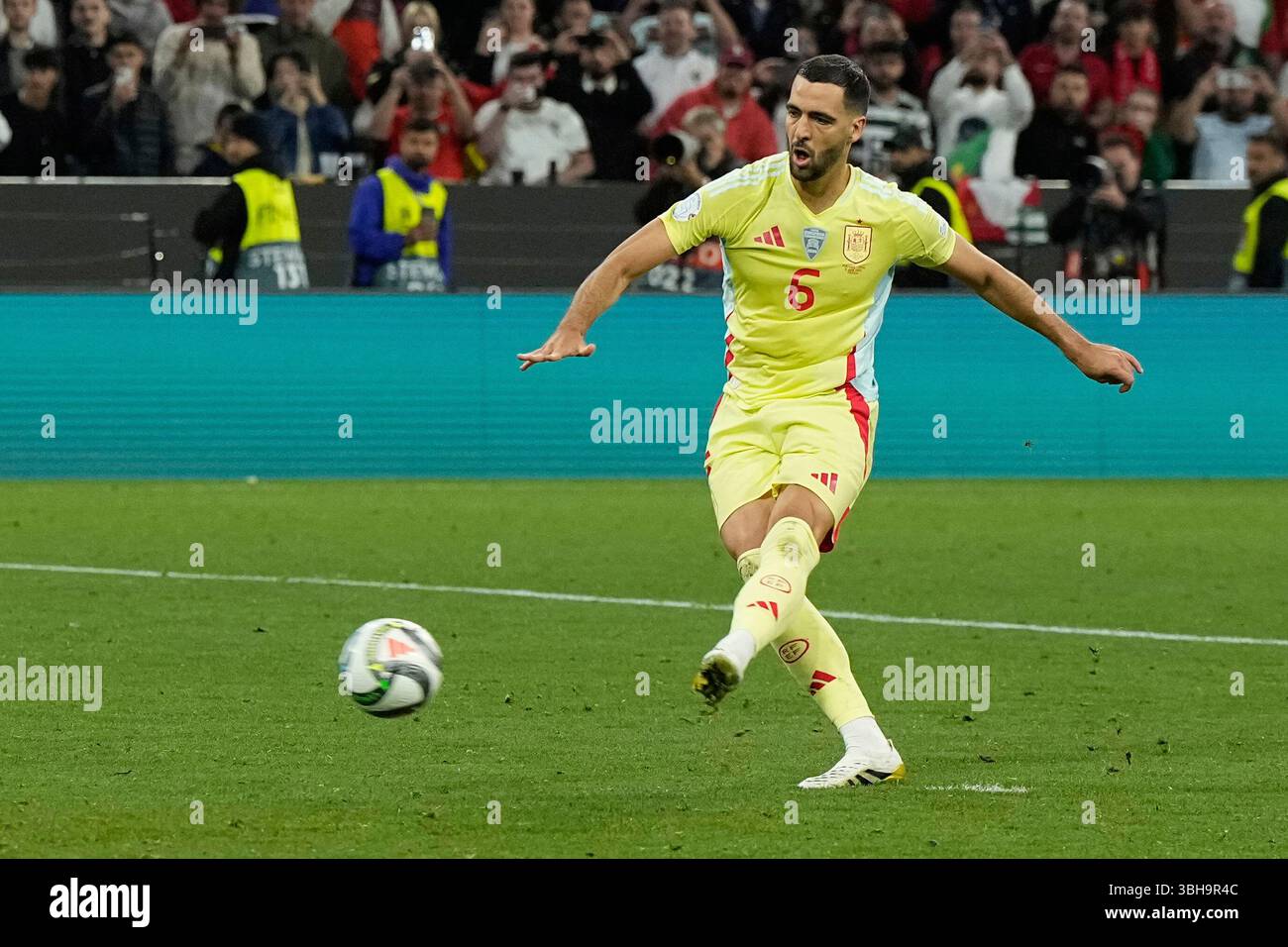 Spain's Mikel Merino scores in the penalty shootout during the Nations ...