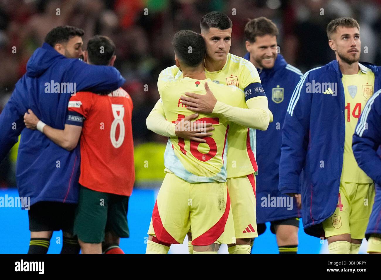 Spain's Alvaro Morata, right, hugs with Spain's Alex Baena after the ...