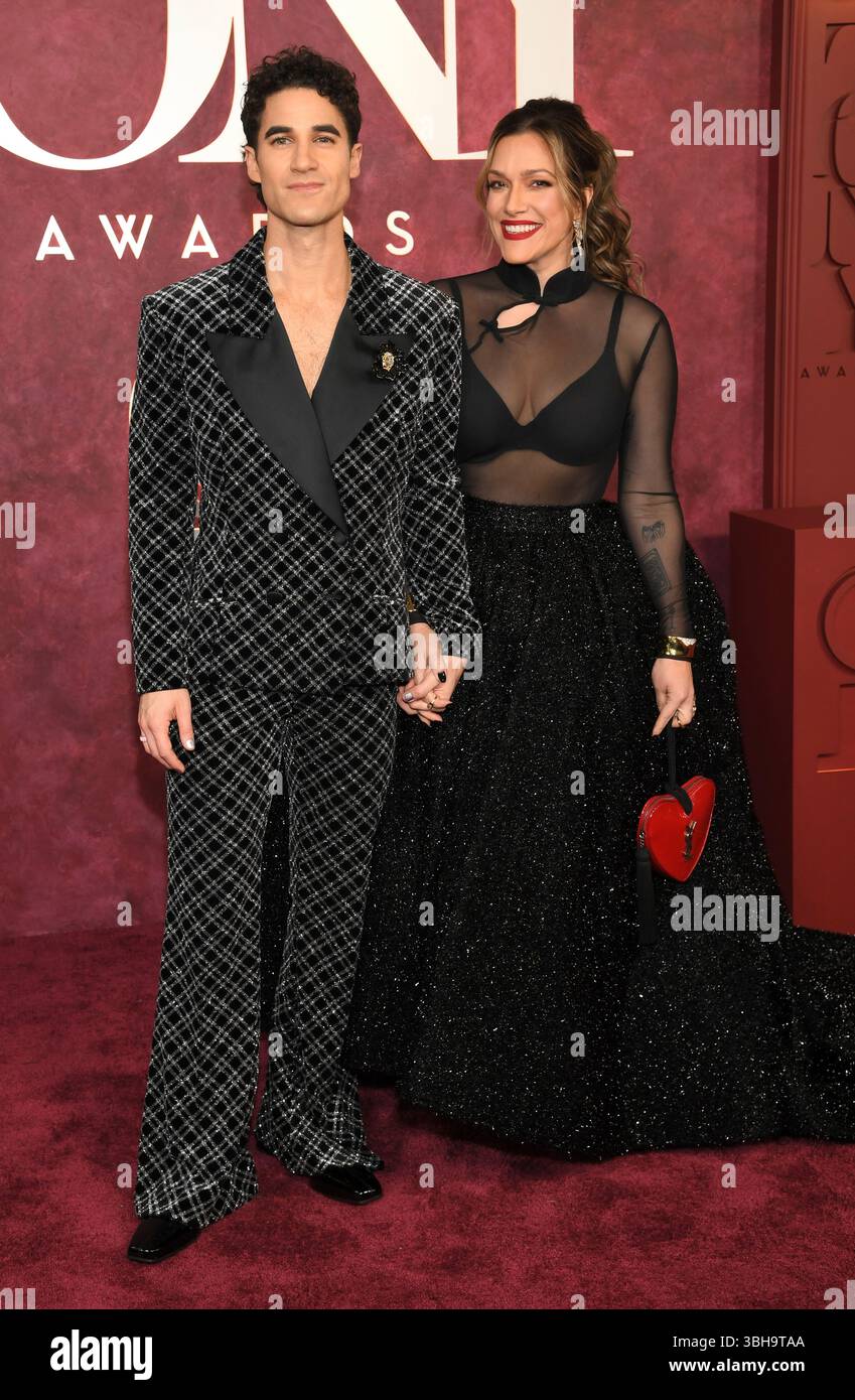 Darren Criss, left, and Mia Swier arrive at the 78th Tony Awards on ...