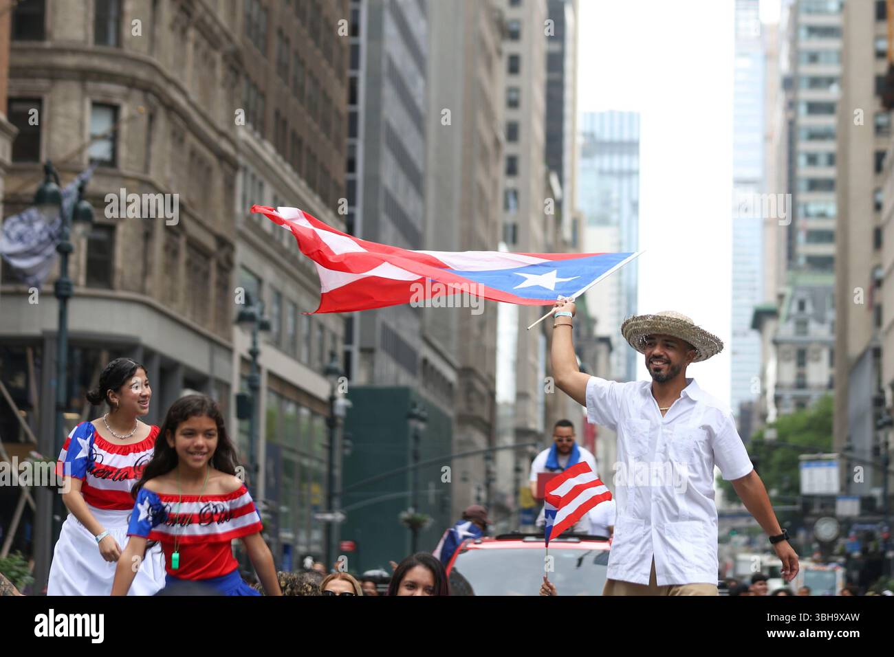 Performers make their way down Fifth Avenue during the Puerto Rican Day ...