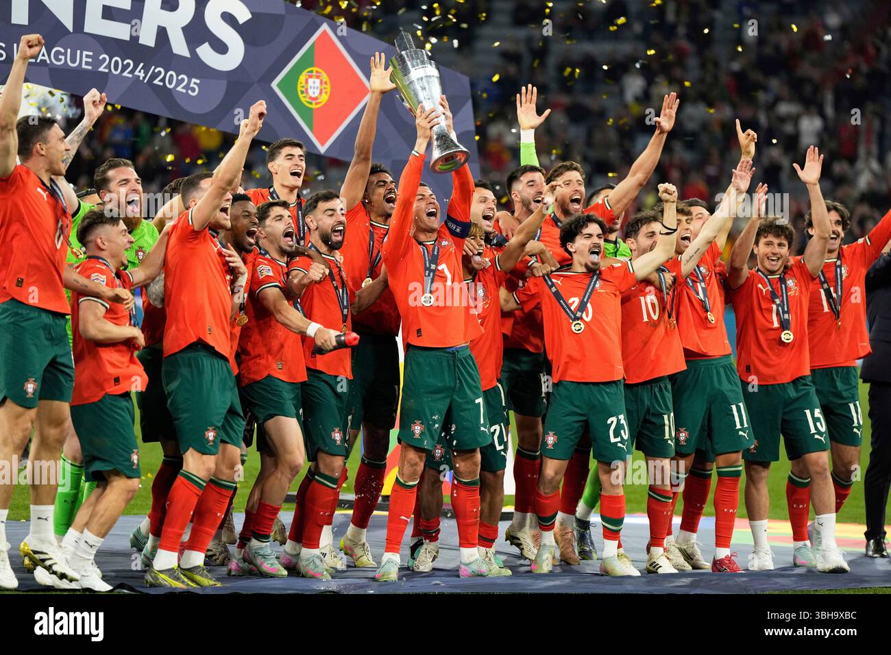 Portugal's players lift the trophy after winning the Nations League ...