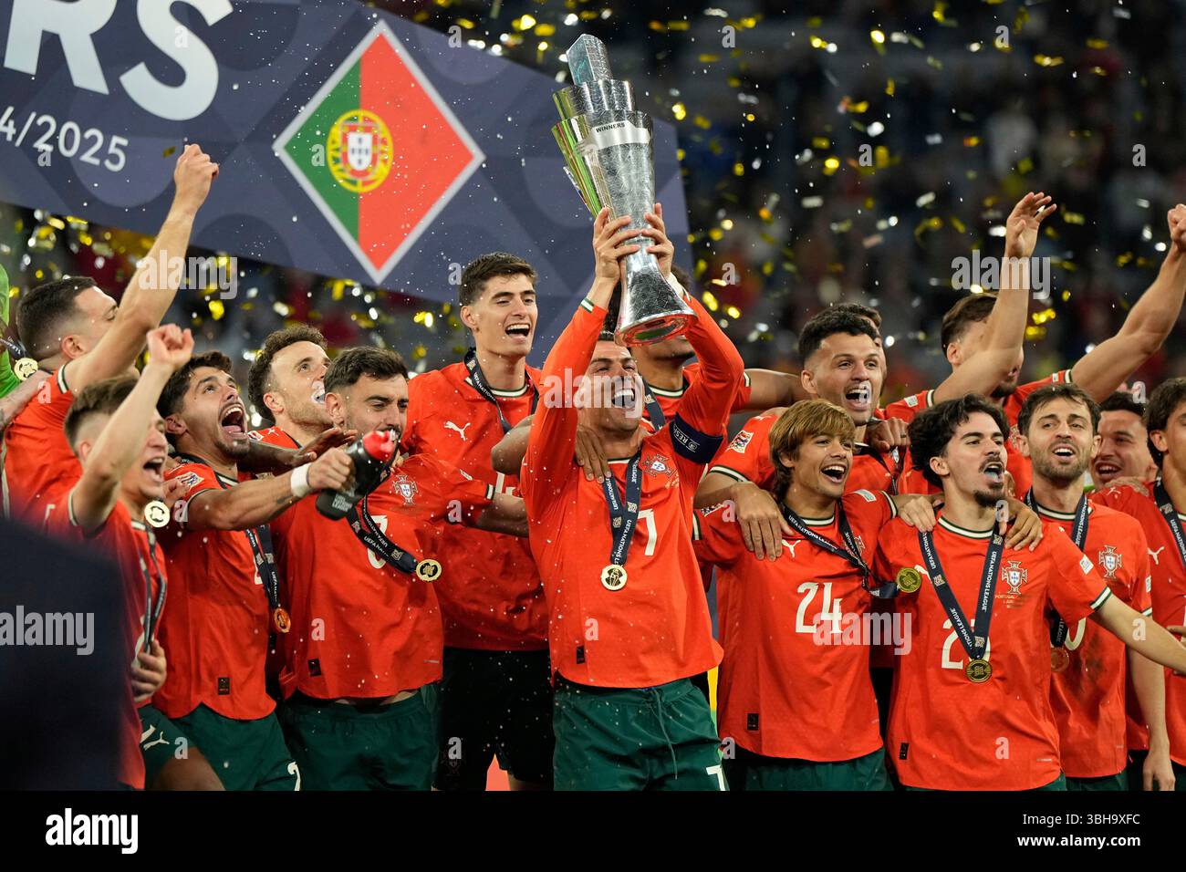 Portugal's players lift the trophy after winning the Nations League ...