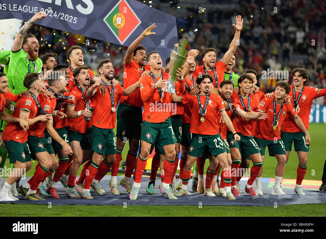 Portugal's players lift the trophy after winning the Nations League ...