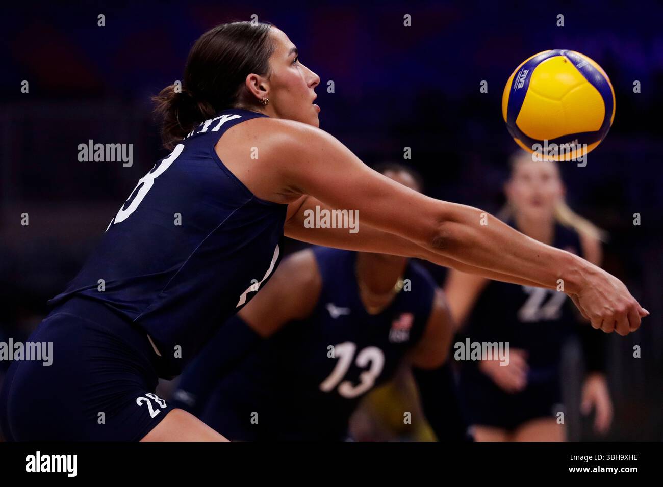 Logan Lednicky of the United States bumps a ball against South Korea ...
