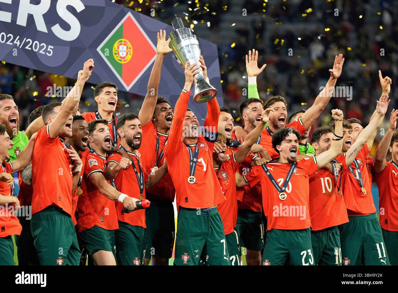 Portugal's players lift the trophy after winning the Nations League ...