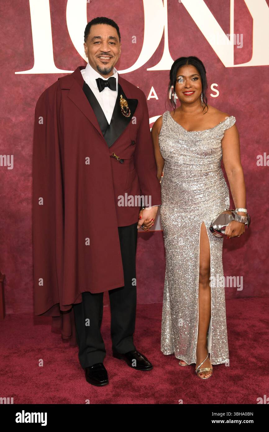 Harry Lennix, left, and Djena Graves Lennix arrive at the 78th Tony ...