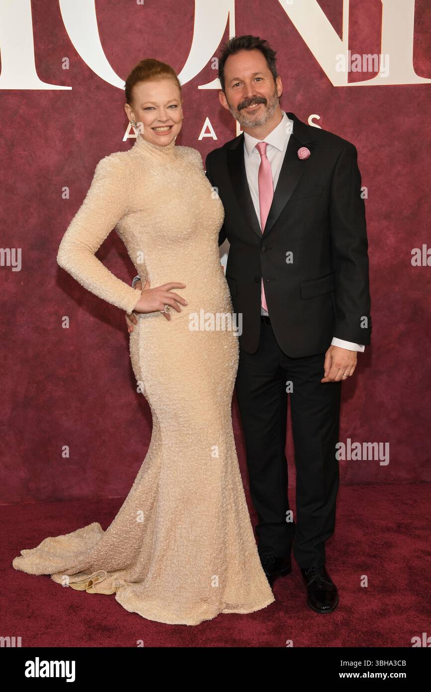 Sarah Snook, left, and Dave Lawson arrive at the 78th Tony Awards on ...