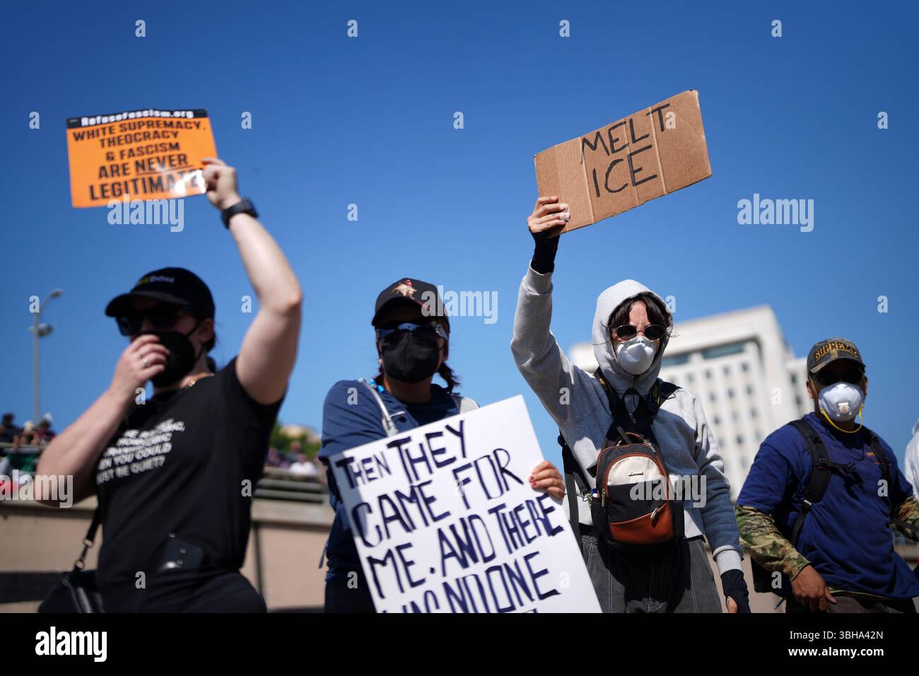 Protesters block the 101 Freeway near the metropolitan detention center ...
