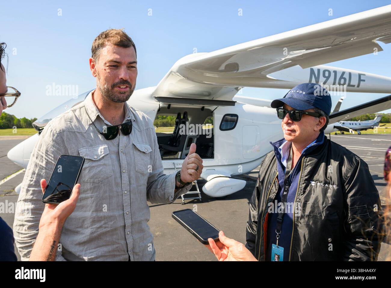 BETA Technologies CEO and founder Kyle Clark, left, and Blade CEO Rob ...