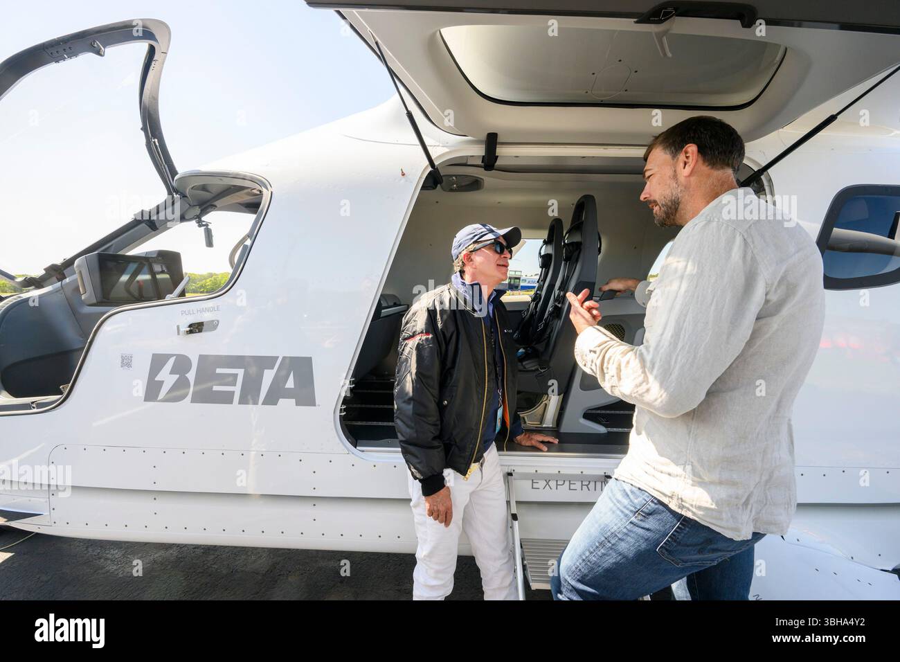 BETA Technologies CEO and founder Kyle Clark, right, and Blade CEO Rob ...