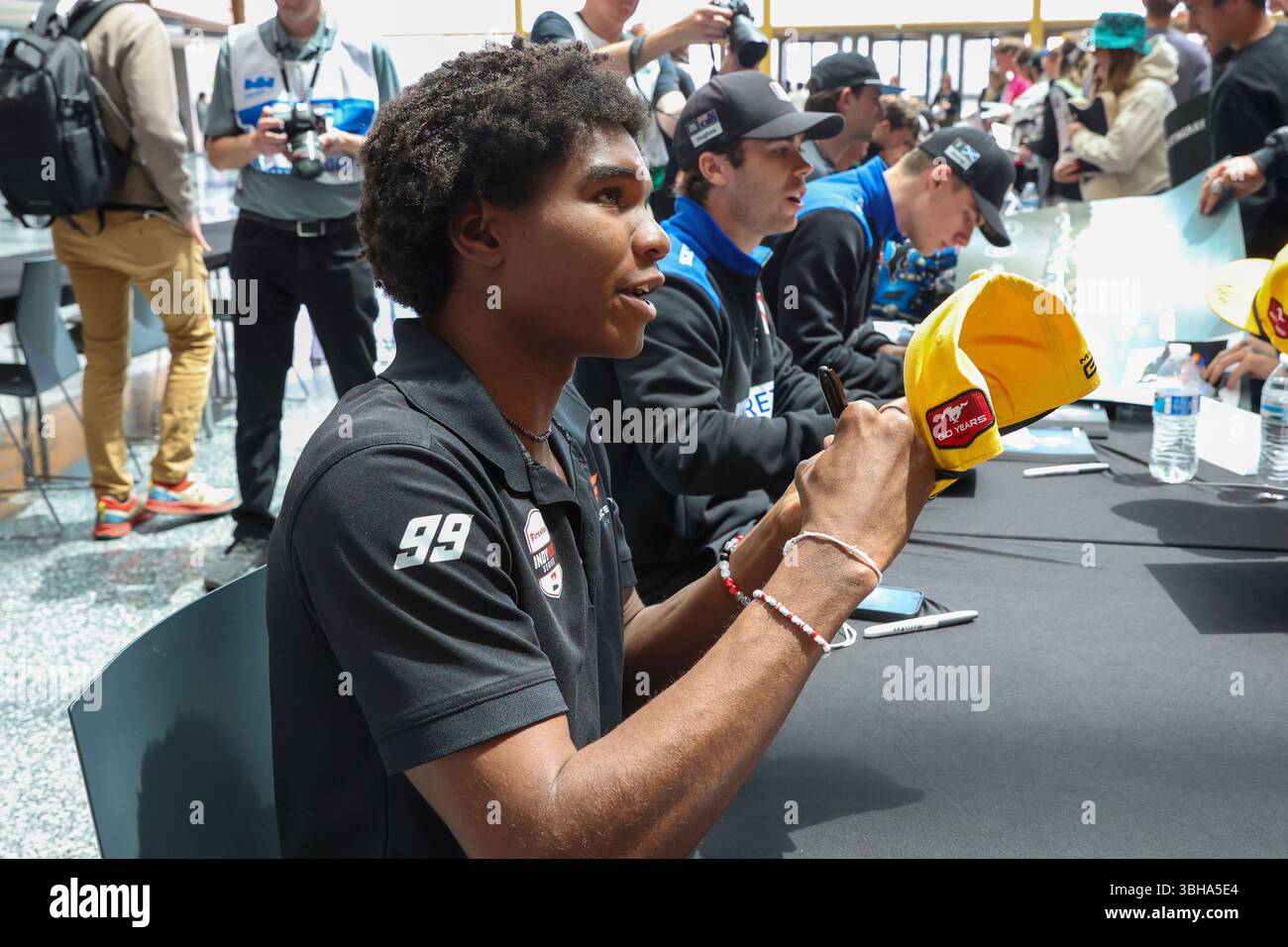May 31st, 2025: Abel Motorsports driver Myles Rowe (99) signs during ...