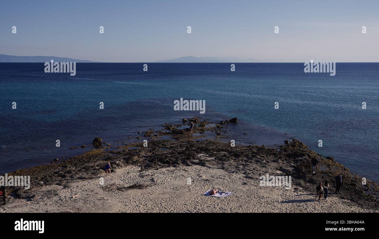 CAPO VATICANO, ITALY - JUNE 2, 2025 - Tourists relaxing on Capo ...