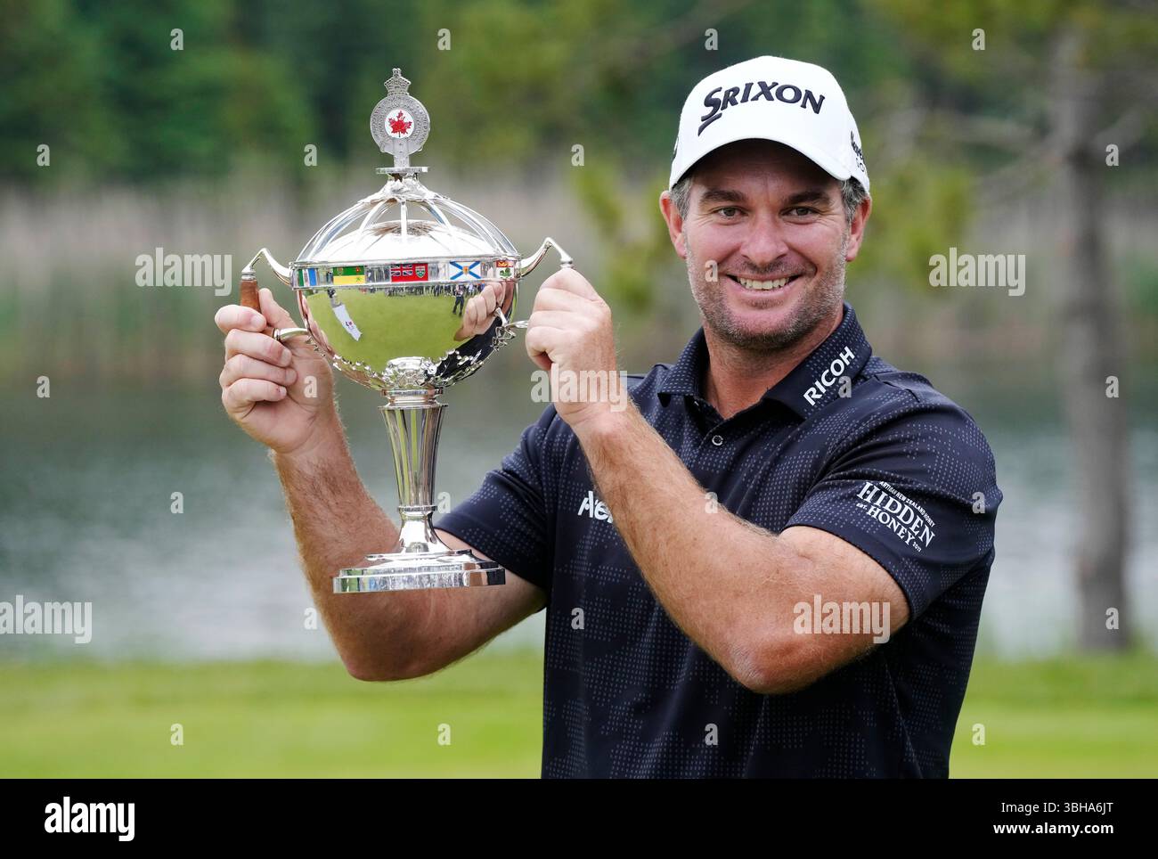 Ryan Fox poses with the championship trophy after winning the Canadian ...