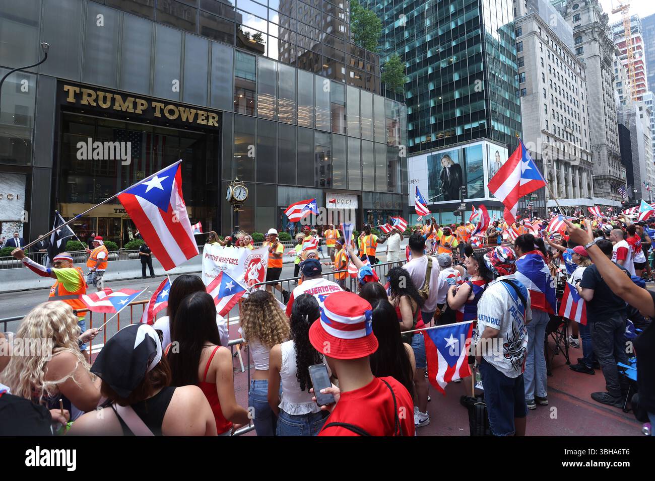 NEW YORK, USA - JUNE 08: Participants pass Trump Tower during the ...