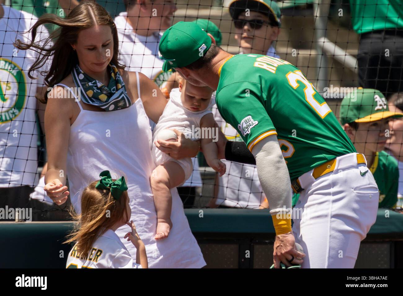 Athletics outfielder Brent Rooker (25) spends time with his family ...
