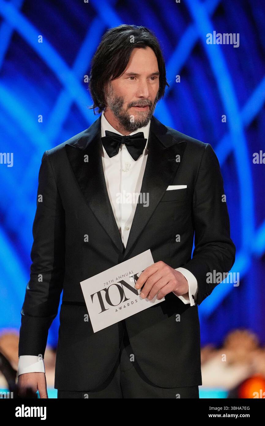 Keanu Reeves presents the award for best performance by an actress in a ...