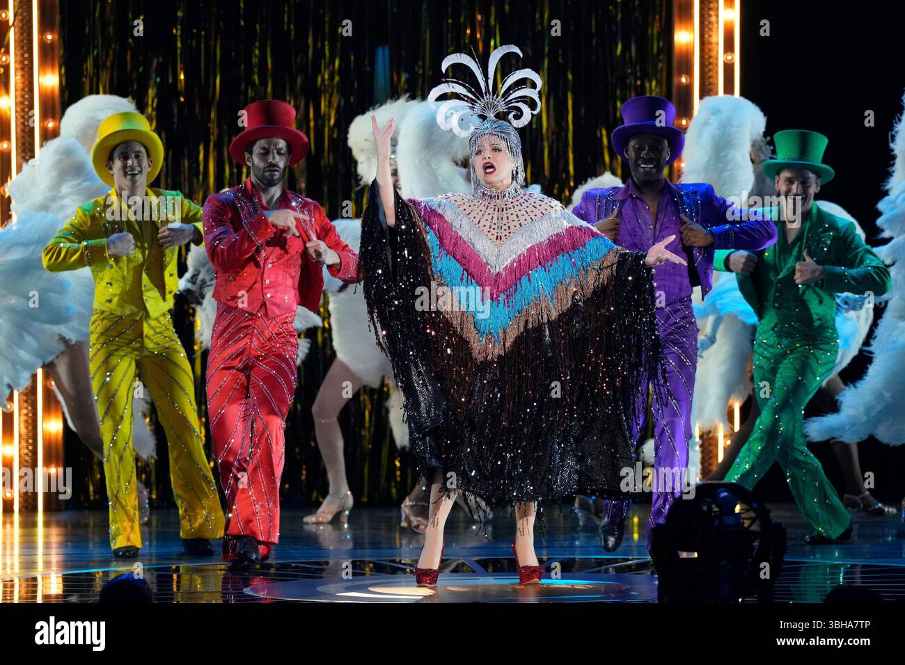 Megan Hilty, center, performs 'For the Gaze" during the 78th Tony ...