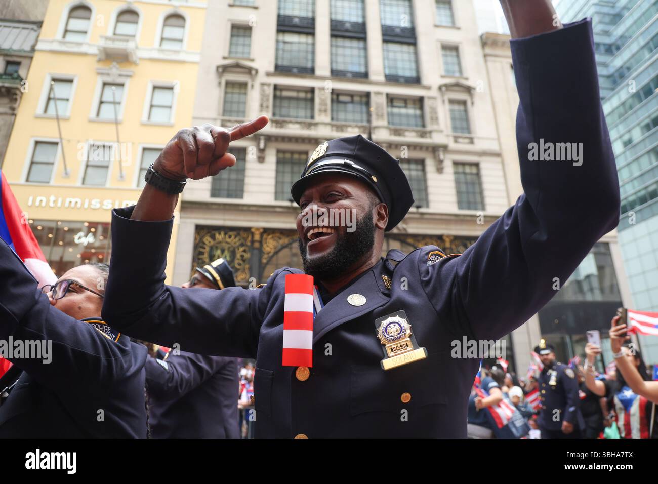 Police officers march in the 68th Annual Puerto Rican Day Parade on 5th ...