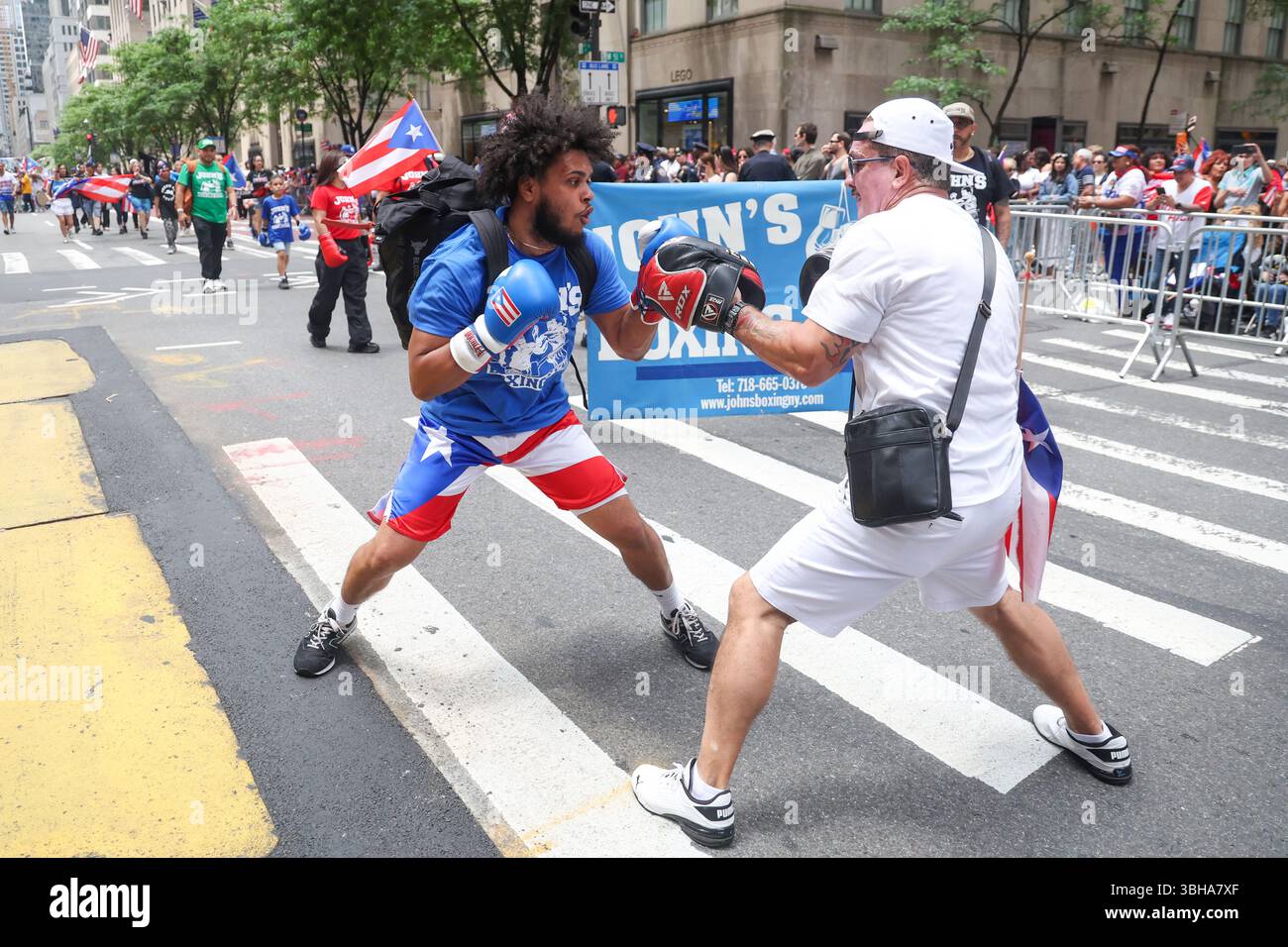 Performers entertain crowds as they march the 68th Annual Puerto Rican ...