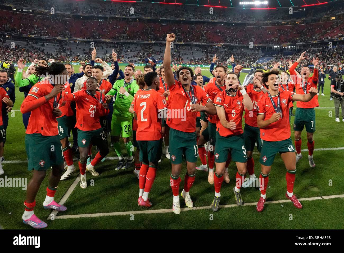 Portugal's players celebrate with the trophy after winning the Nations ...