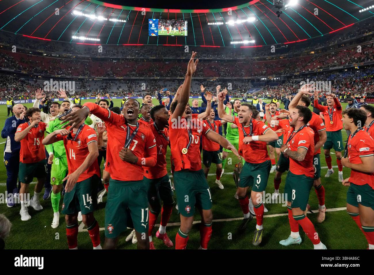 Portugal's players celebrate with the trophy after winning the Nations ...