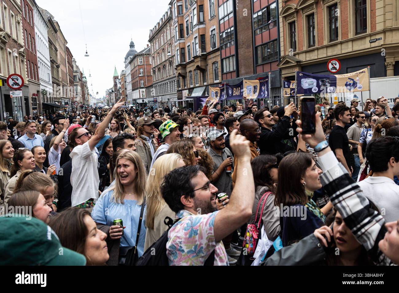 People participate in the Copenhagen Distortion 2025 in the streets of ...