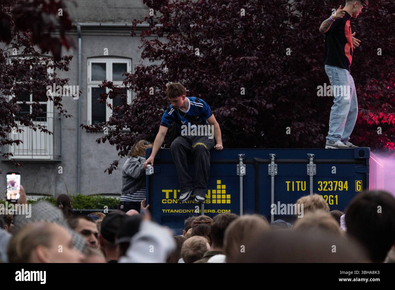 Revellers sitting on top of a container during Copenhagen Distortion ...
