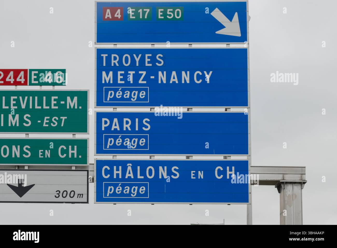 Driving in summer on highway and road signs direction to Reims, Paris ...