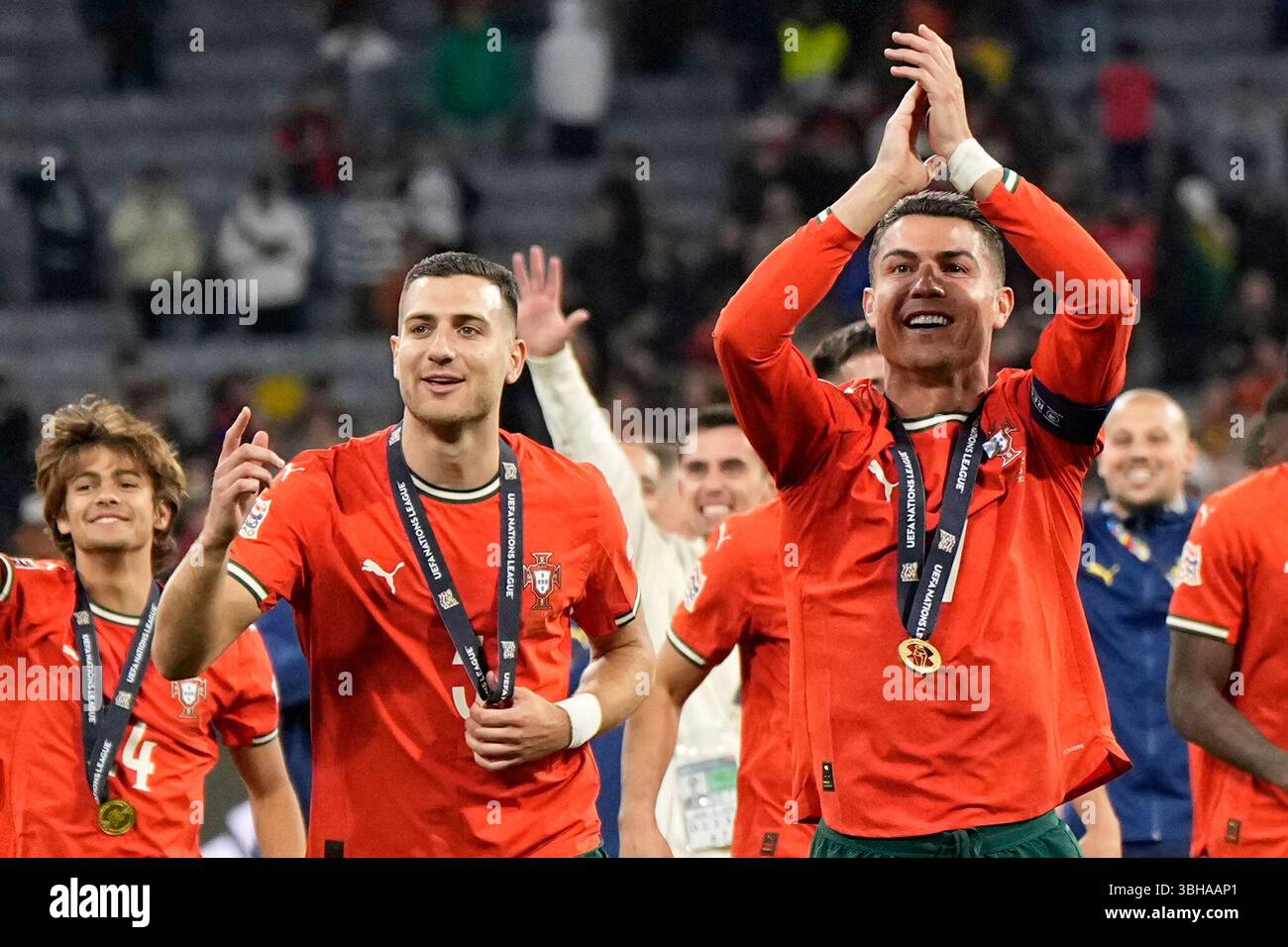 Portugal's Cristiano Ronaldo celebrates with his team after winning the ...