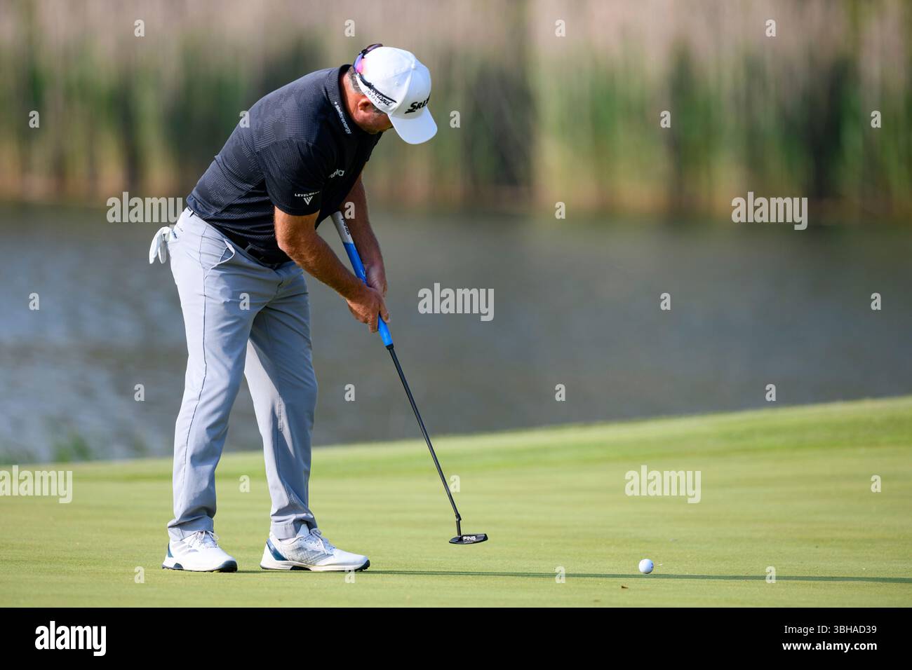 CALEDON, ON - JUNE 08: Ryan Fox of New Zealand putts on the 18th green ...