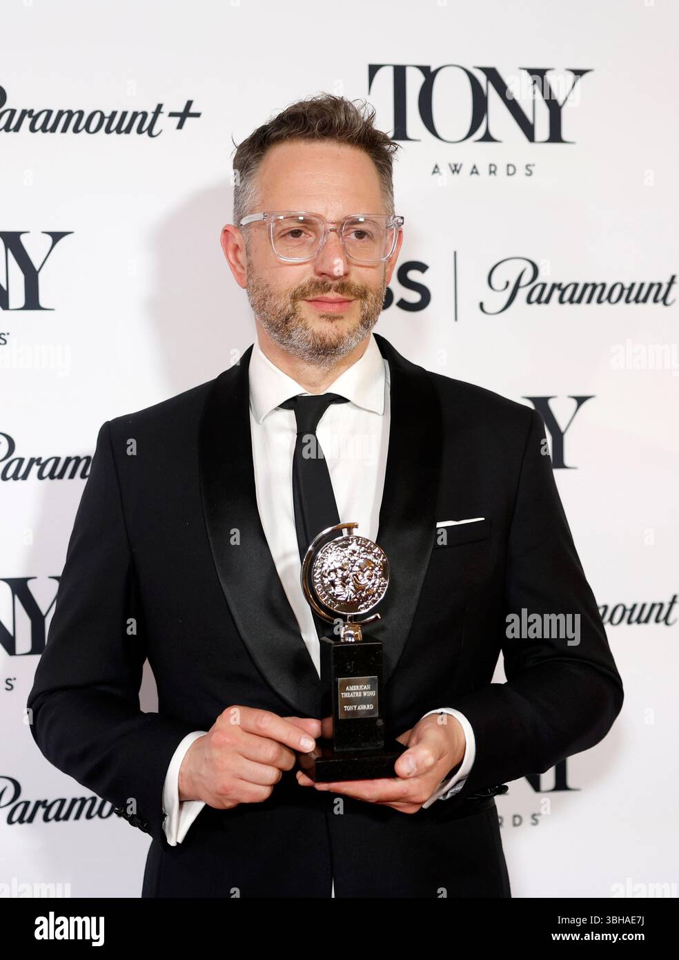 Jon Clark poses with the Best Lighting Design of a Play award for ...