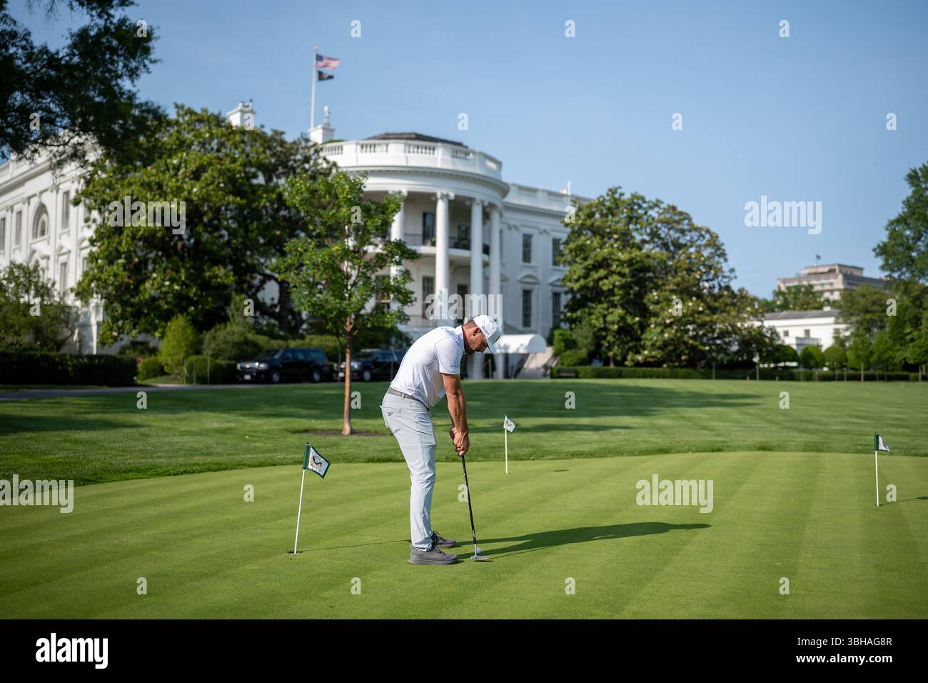 Professional golfer Bryson DeChambeau putting on the South Lawn of the ...
