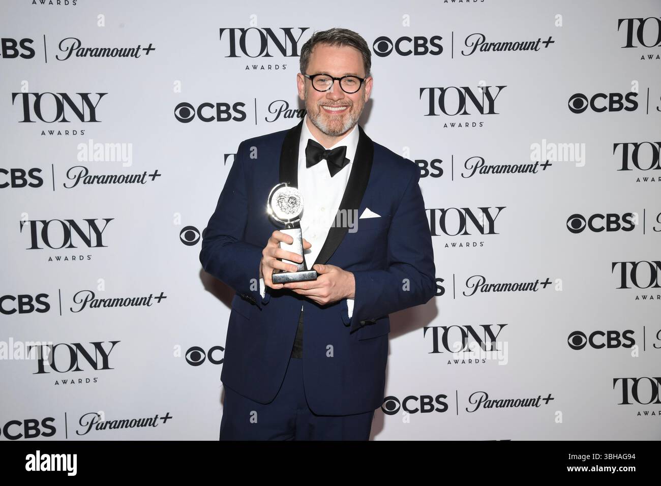 Michael Arden poses in the press room with award for best direction of ...