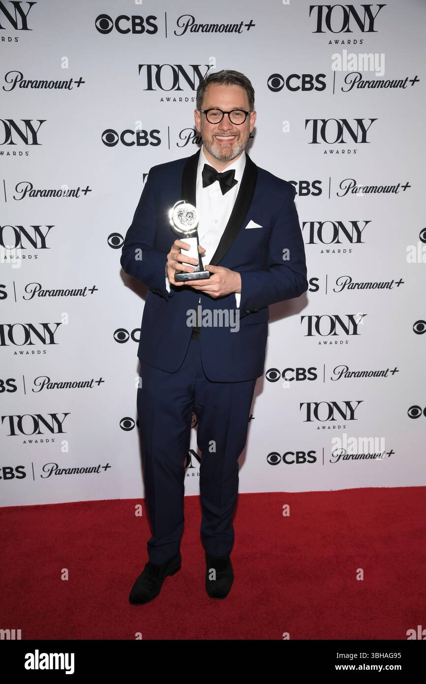 Michael Arden poses in the press room with award for best direction of ...
