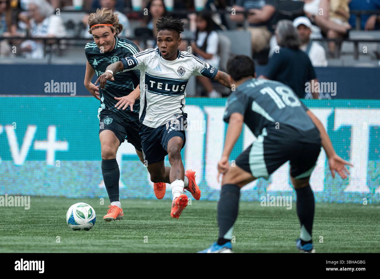 Seattle Sounders' Pedro De La Vega, left, and Vancouver Whitecaps ...