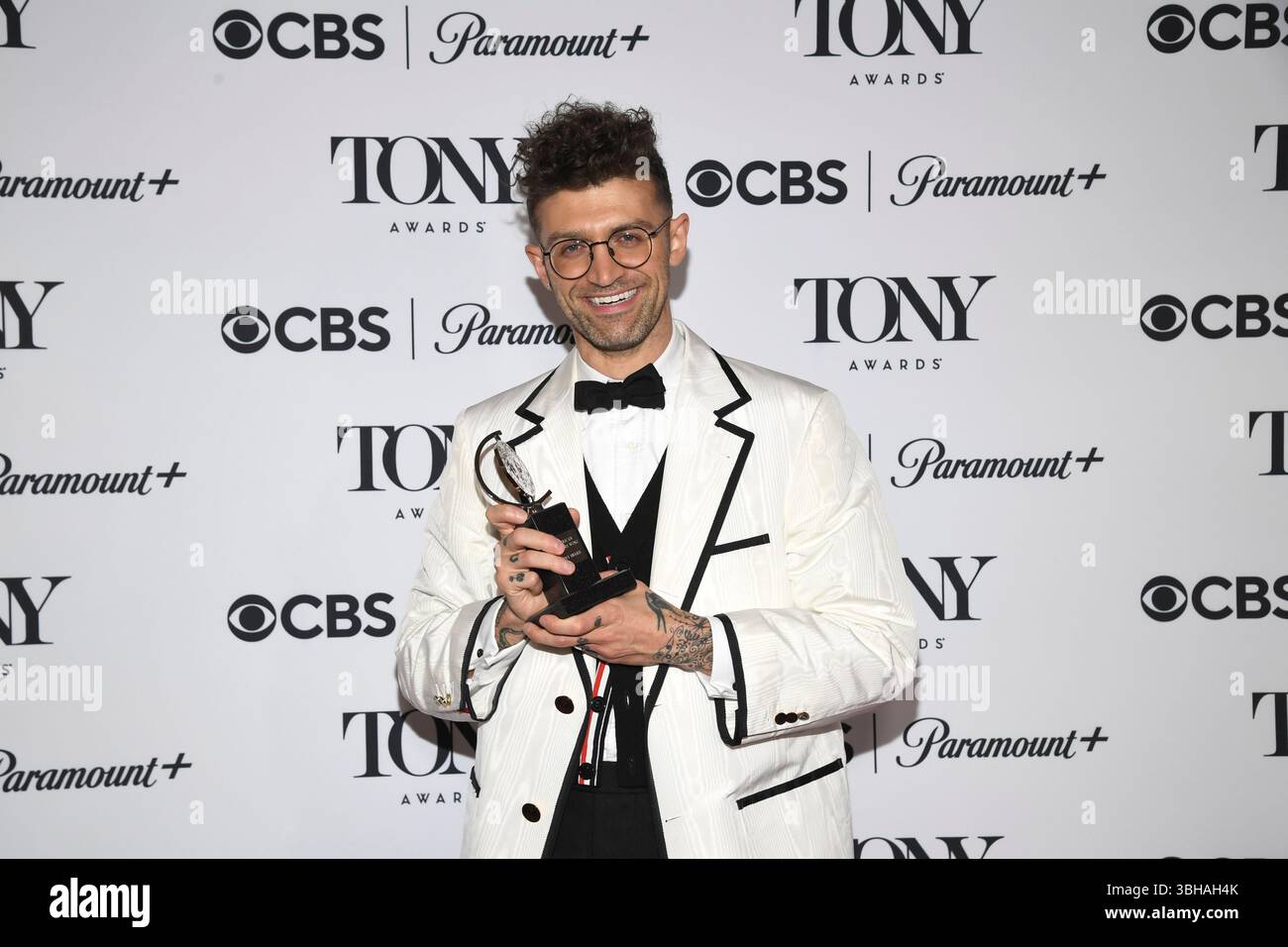 Sam Pinkleton poses in the press room with the award for best direction ...