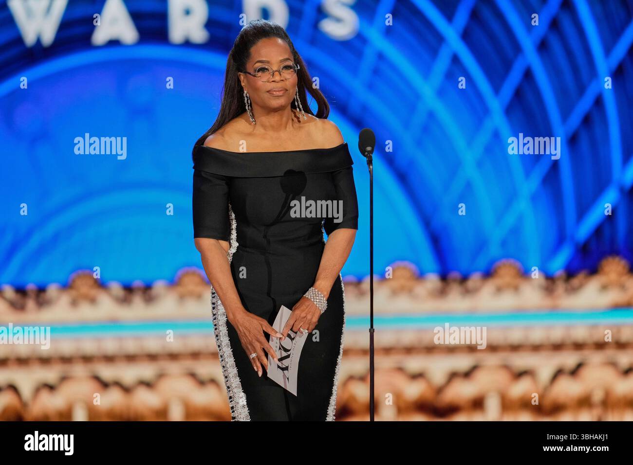 Oprah Winfrey presents the award for best performance by an actress in ...