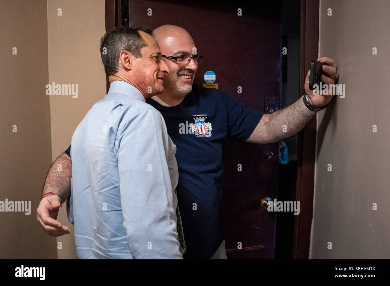 Anthony Weiner poses for a selfie with a Lower East Side resident while ...