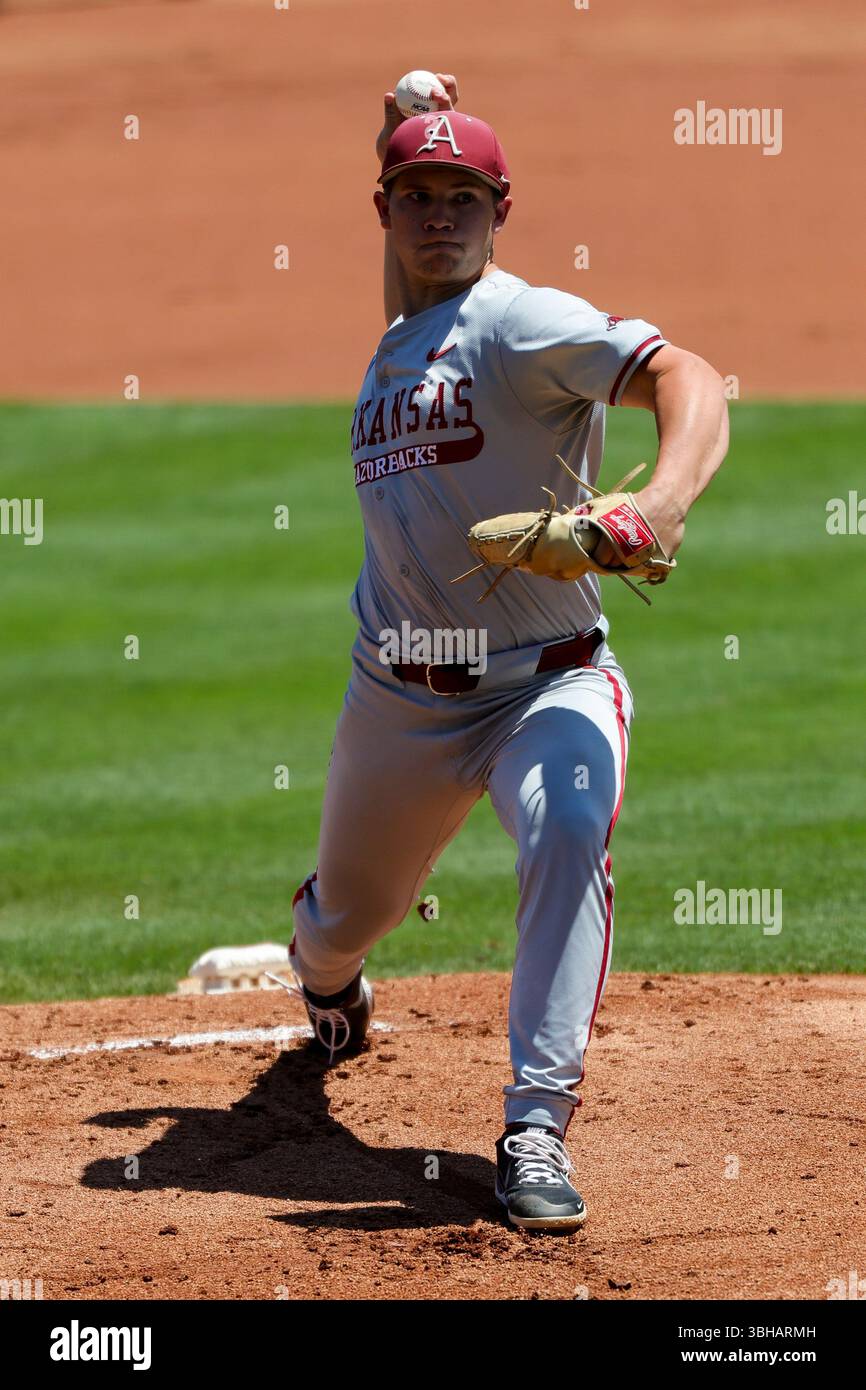 June 8, 2025: Gage Wood (14) of Arkansas prepares to deliver a pitch to ...