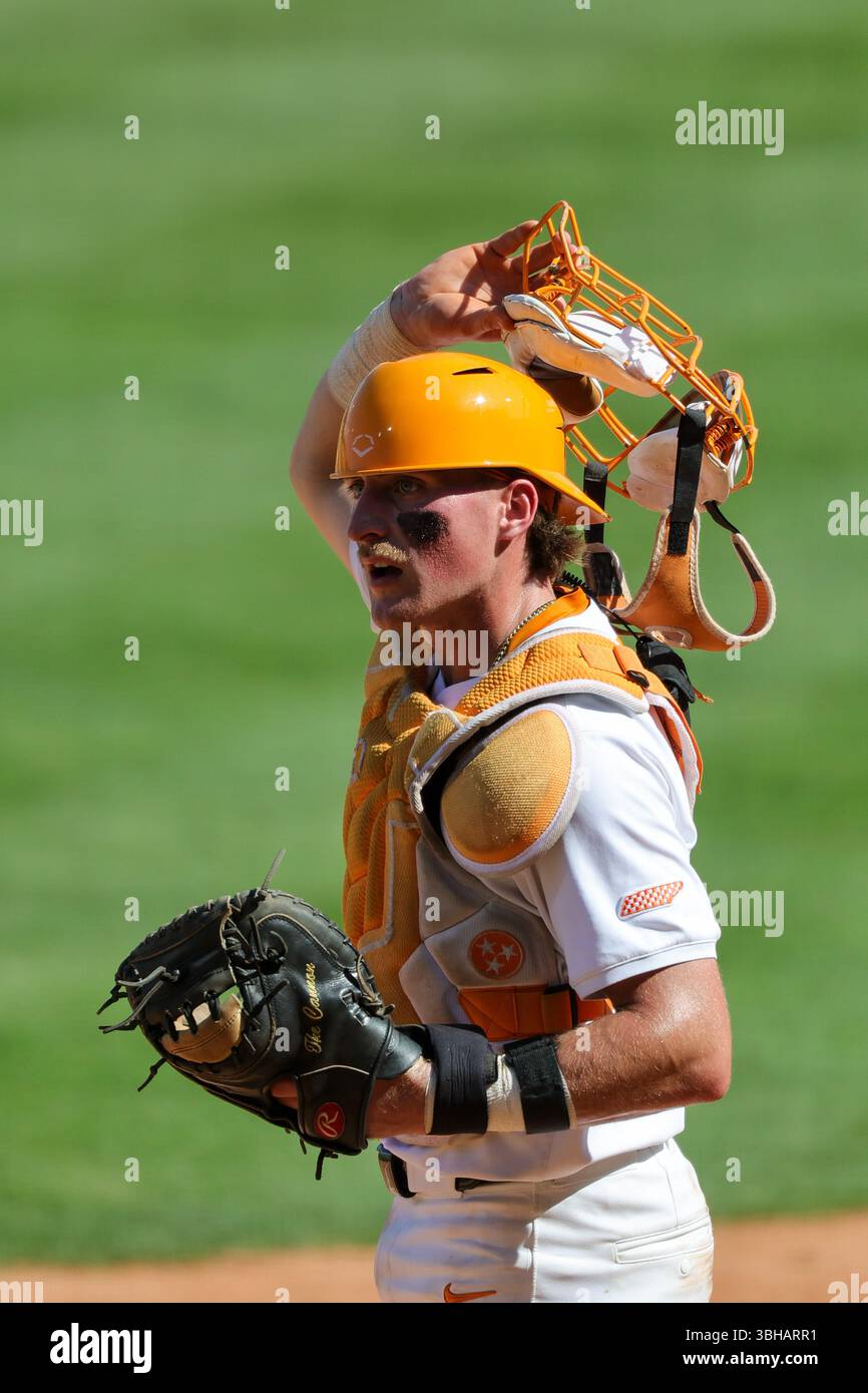 June 8, 2025: Volunteer catcher Cannon Peebles (5) lifts his mask and ...