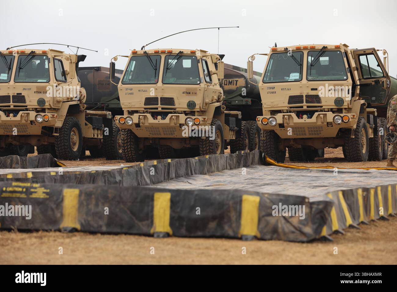 Soldiers from the 877th, 1017th, and 900th Quartermaster Companies ...
