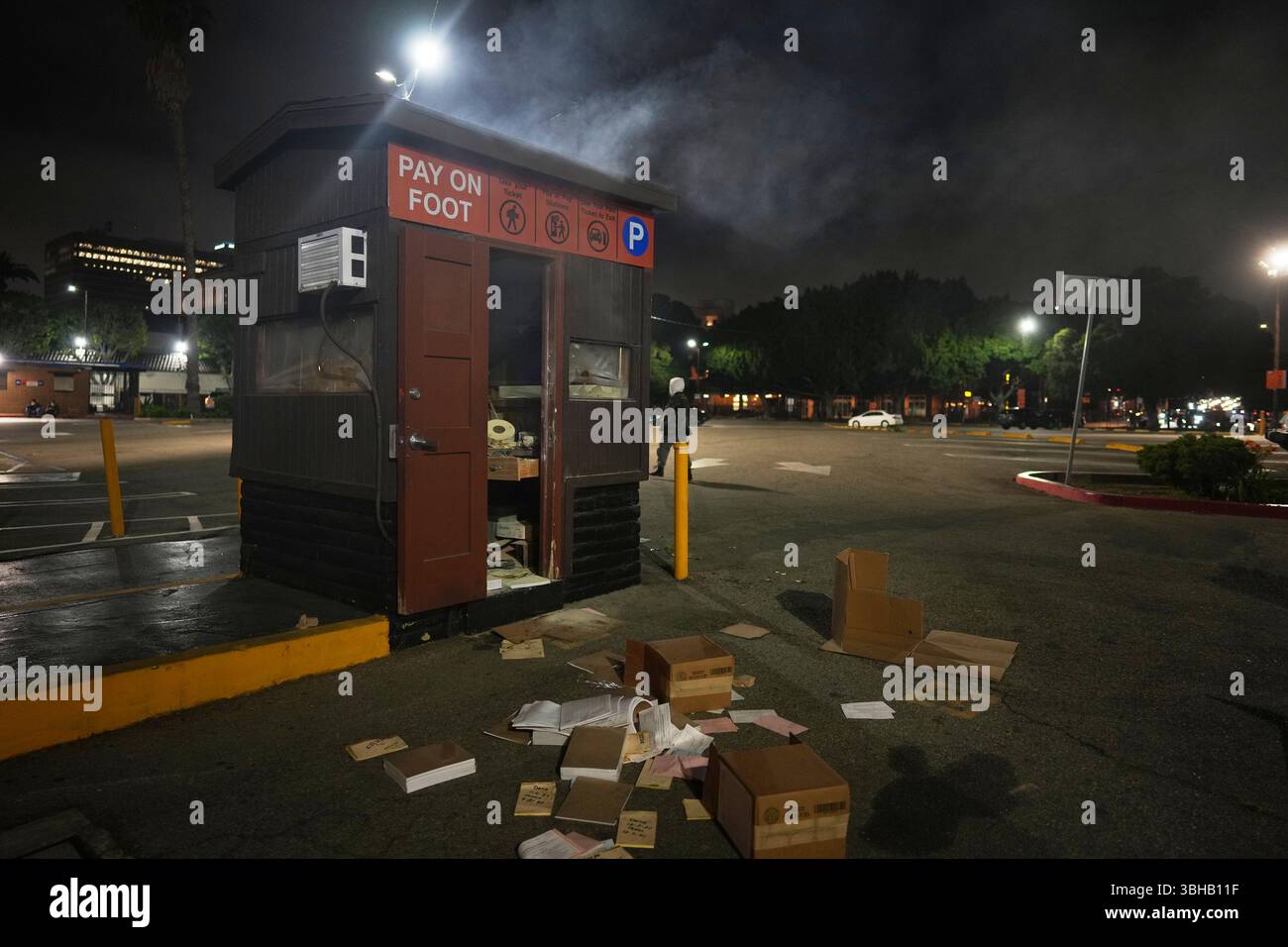 A parking booth is vandalized near the metropolitan detention center of ...