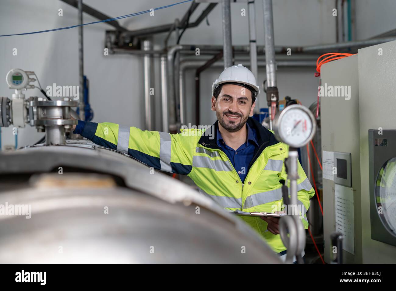 Portrait Engineers or utility staff wearing safety helmet fix the ...