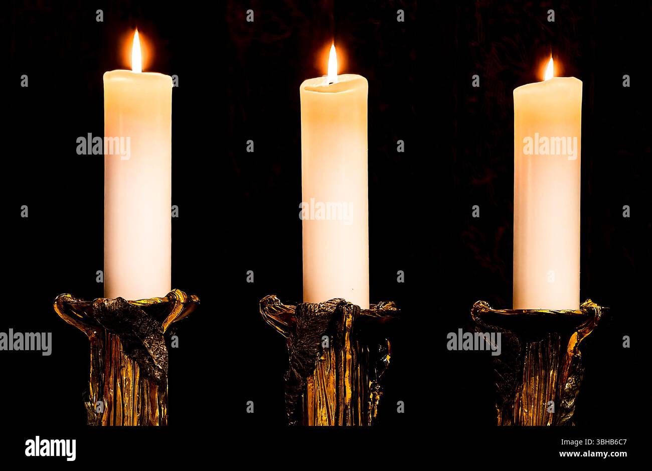 Three Burning Candles in Artistic Holders — Warm Glowing Candlelight ...