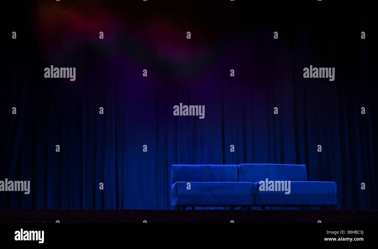 Blue Velvet Sofa on a Theatrical Stage with Blue Curtains Stock Photo ...