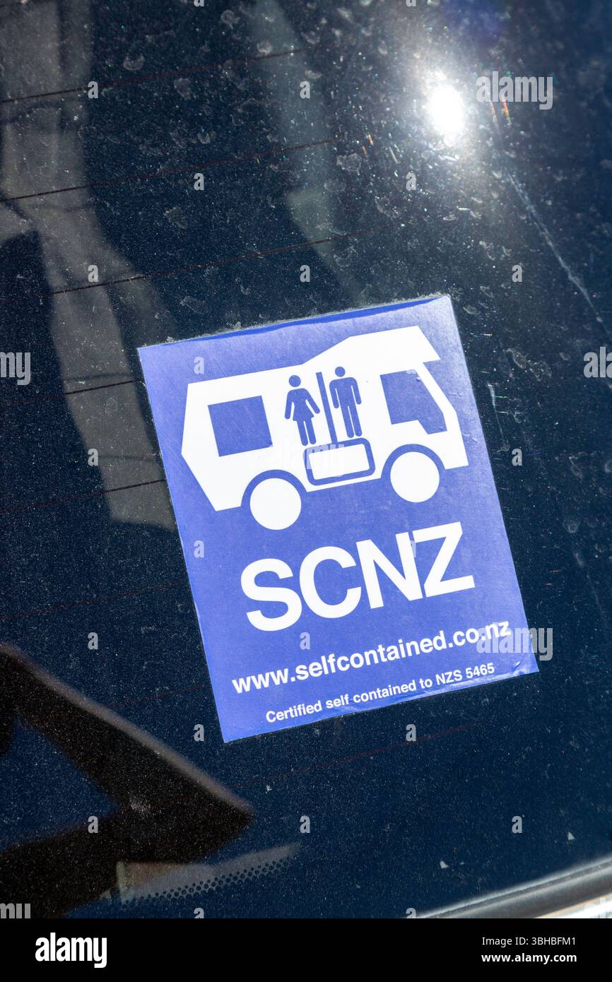 self-contained camper sign in the back of a campervan in Queenstown ...