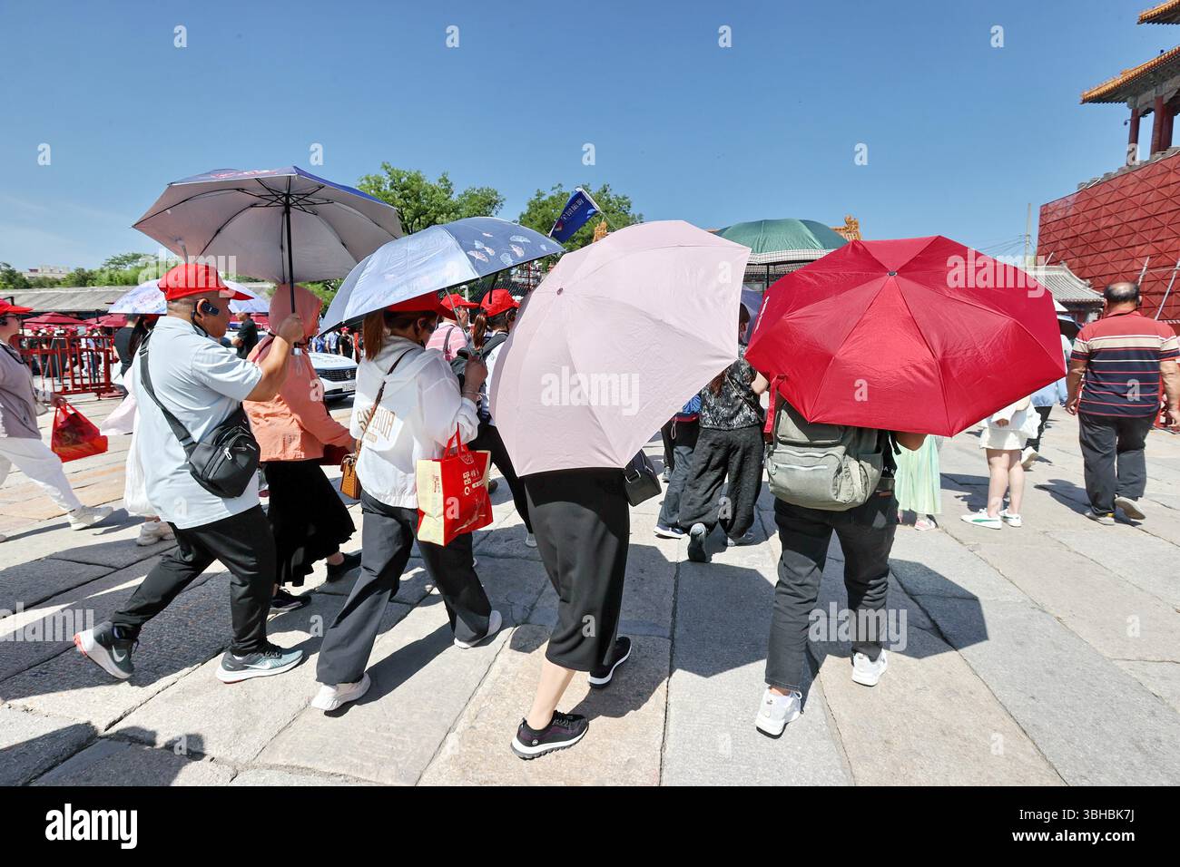 Tourists visit the Palace Museum amid hot weather in Beijing, China, 6 ...