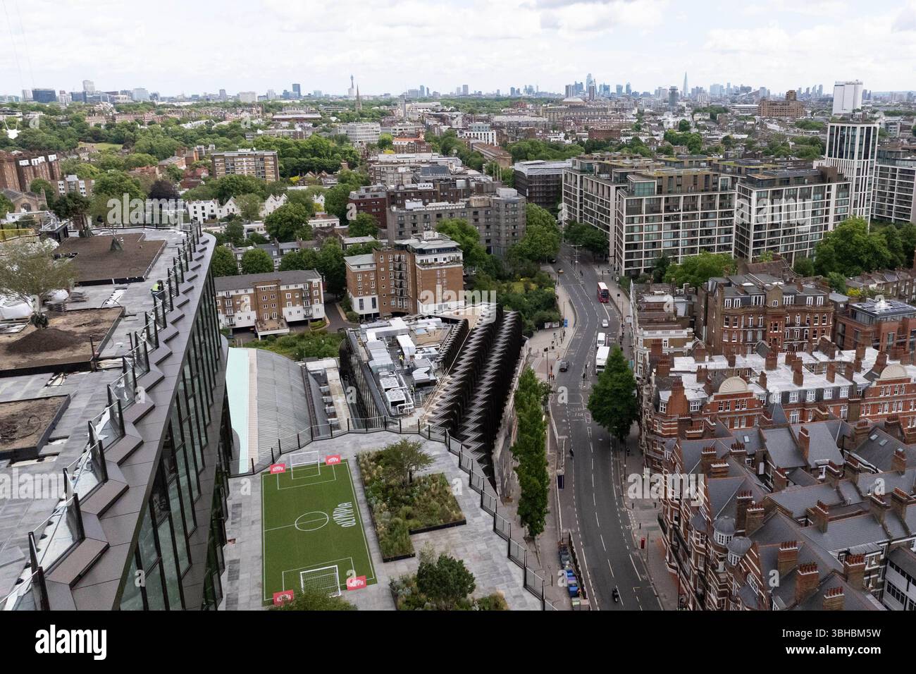 EDITORIAL USE ONLY A football pitch is installed on a roof terrace at ...